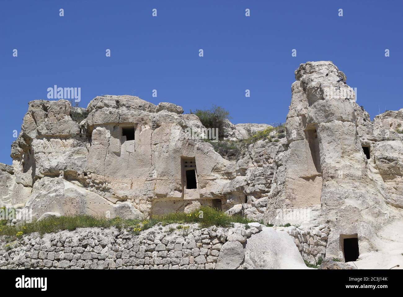 Cappadocia rock houses, caves, and ruins in Goreme, Nevsehir, Anatolia ...