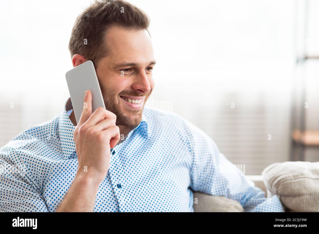 Excited young man calling hi-res stock photography and images - Alamy