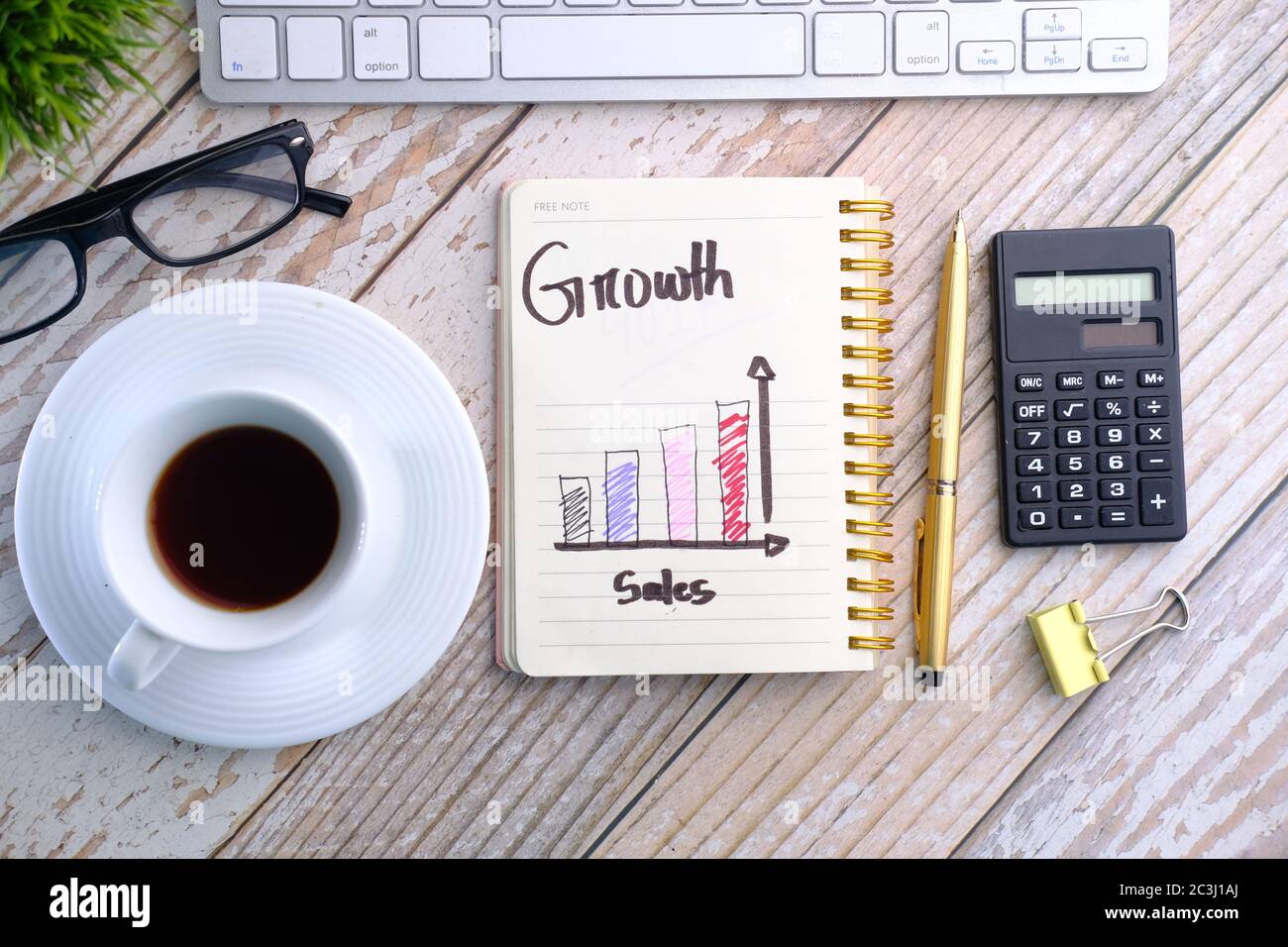 hand written growth chart on notepad at office desk Stock Photo - Alamy