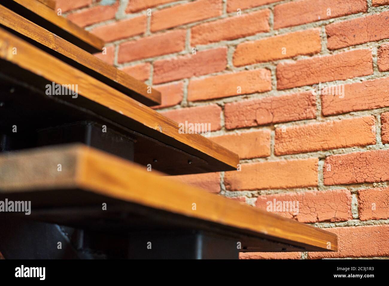 Stairs in loft apartment. Staircase without railing. Modern hipster ...