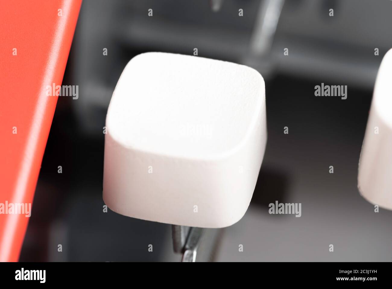 An extreme close-up or a macro shot of a plastic keyboard key from a ...