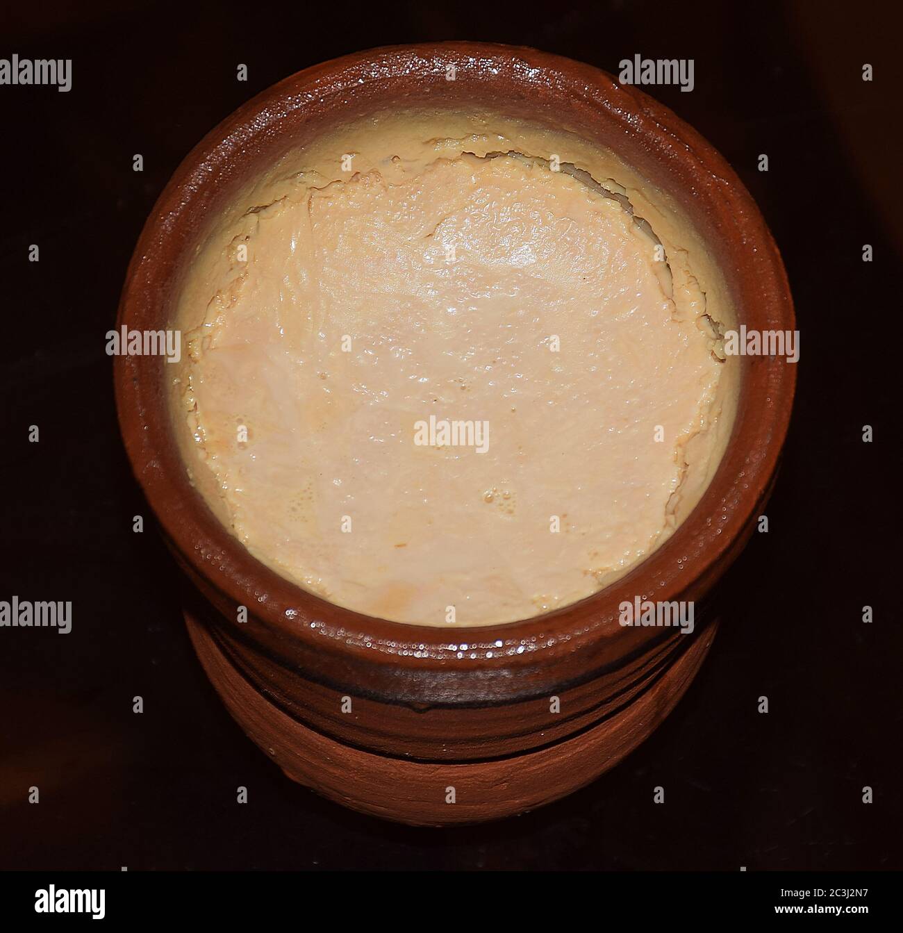 Top angle shot of Indian Bengali Sweet Curd (Misti Doi) served in ...