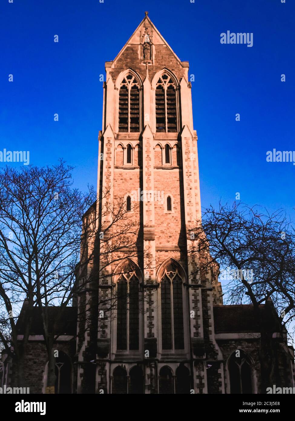 Vertical low angle shot of a tall tower with amazing architecture Stock ...