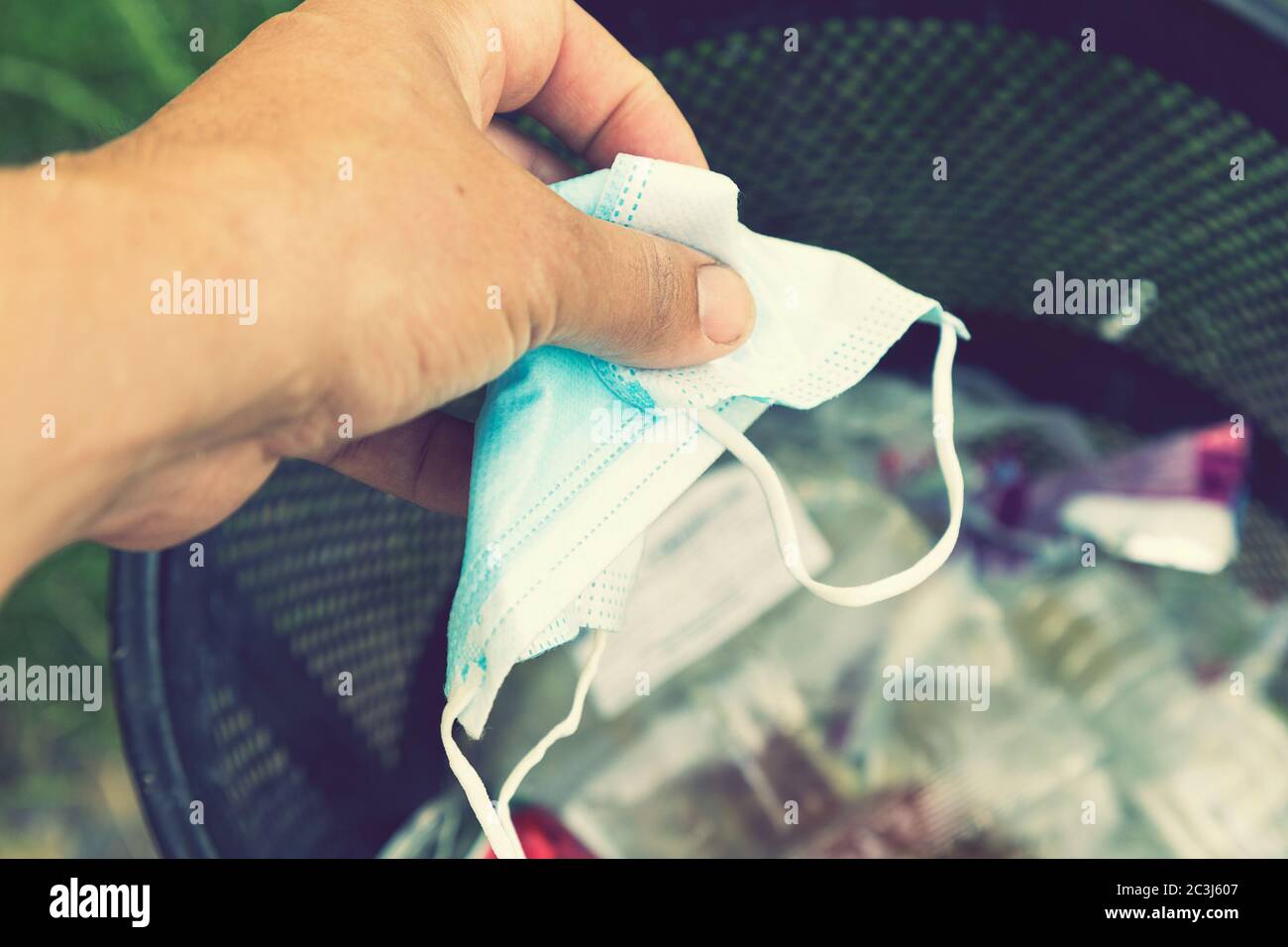 Man throwing waste in park hi-res stock photography and images - Alamy