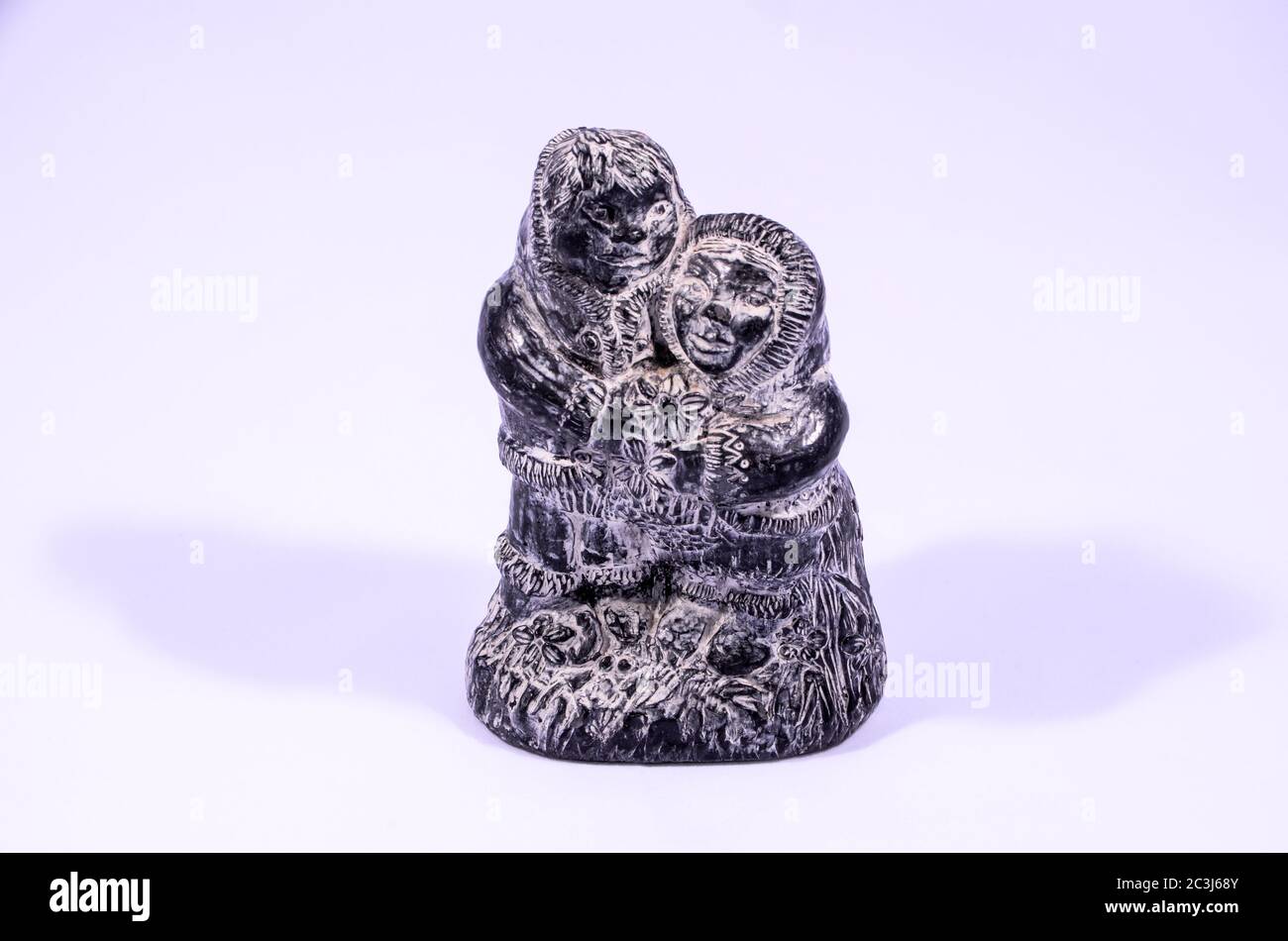 Clay Handmade Statue of a two People on White Background Stock Photo ...