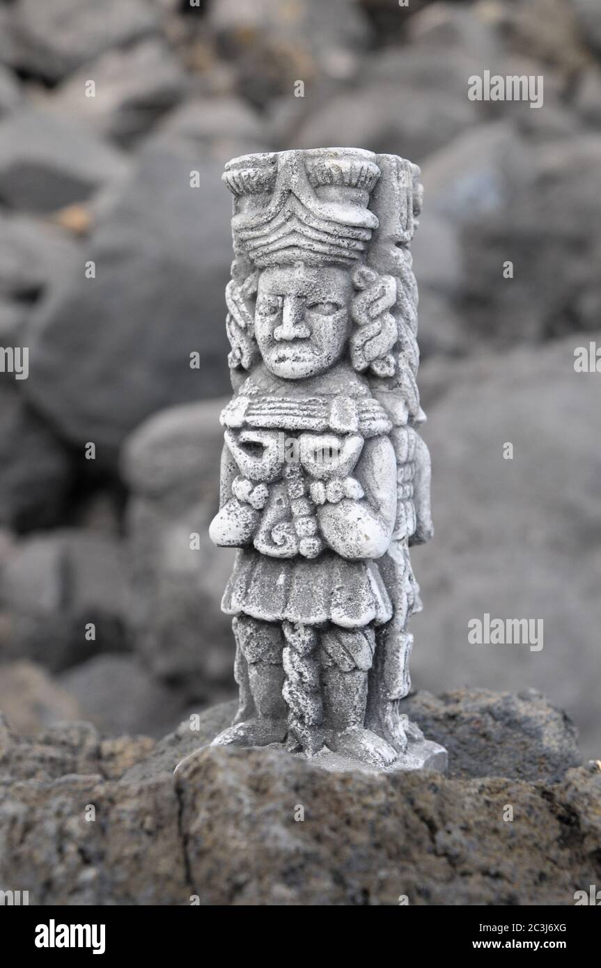 Ancient Maya Statue on the Rocks near the Ocean Stock Photo - Alamy