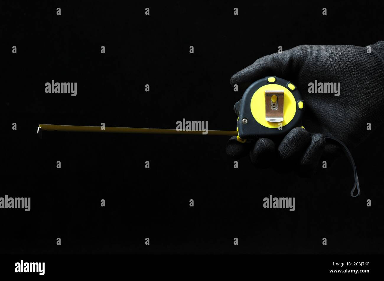 Meter and a Hand on a Black Background Stock Photo - Alamy