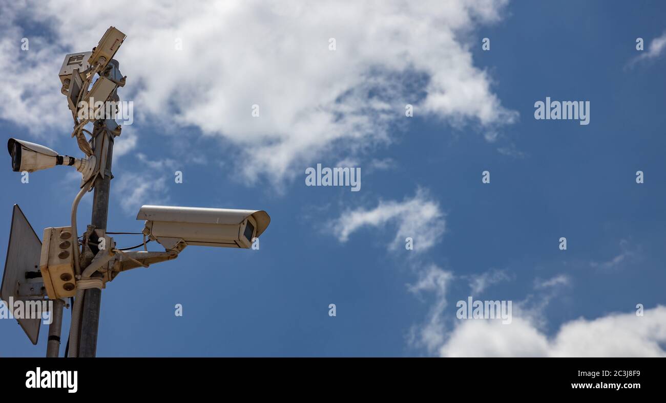 Surveillance camera, CCTV. High resolution security camera, blue sky ...