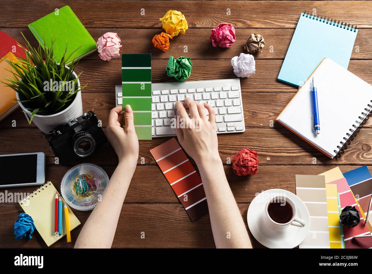 Web designer choosing colors from swatches Stock Photo - Alamy