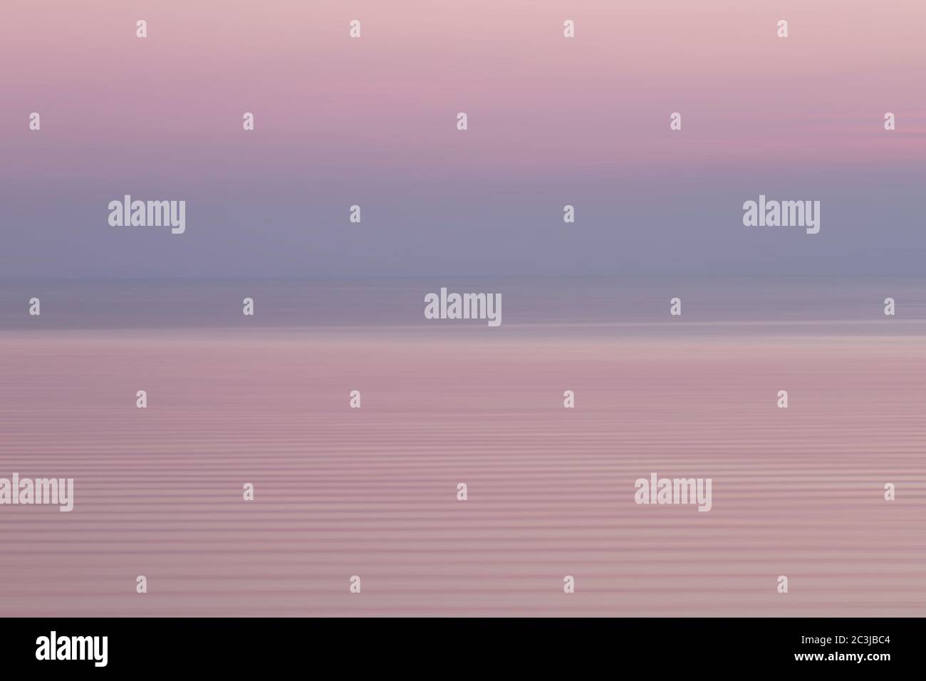 Pink sea landscape at dawn Stock Photo - Alamy
