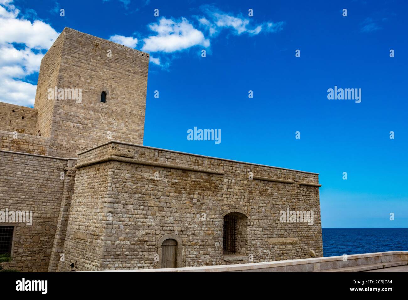 View of the Swabian castle of Trani. Stone fortress, on the sea. In ...