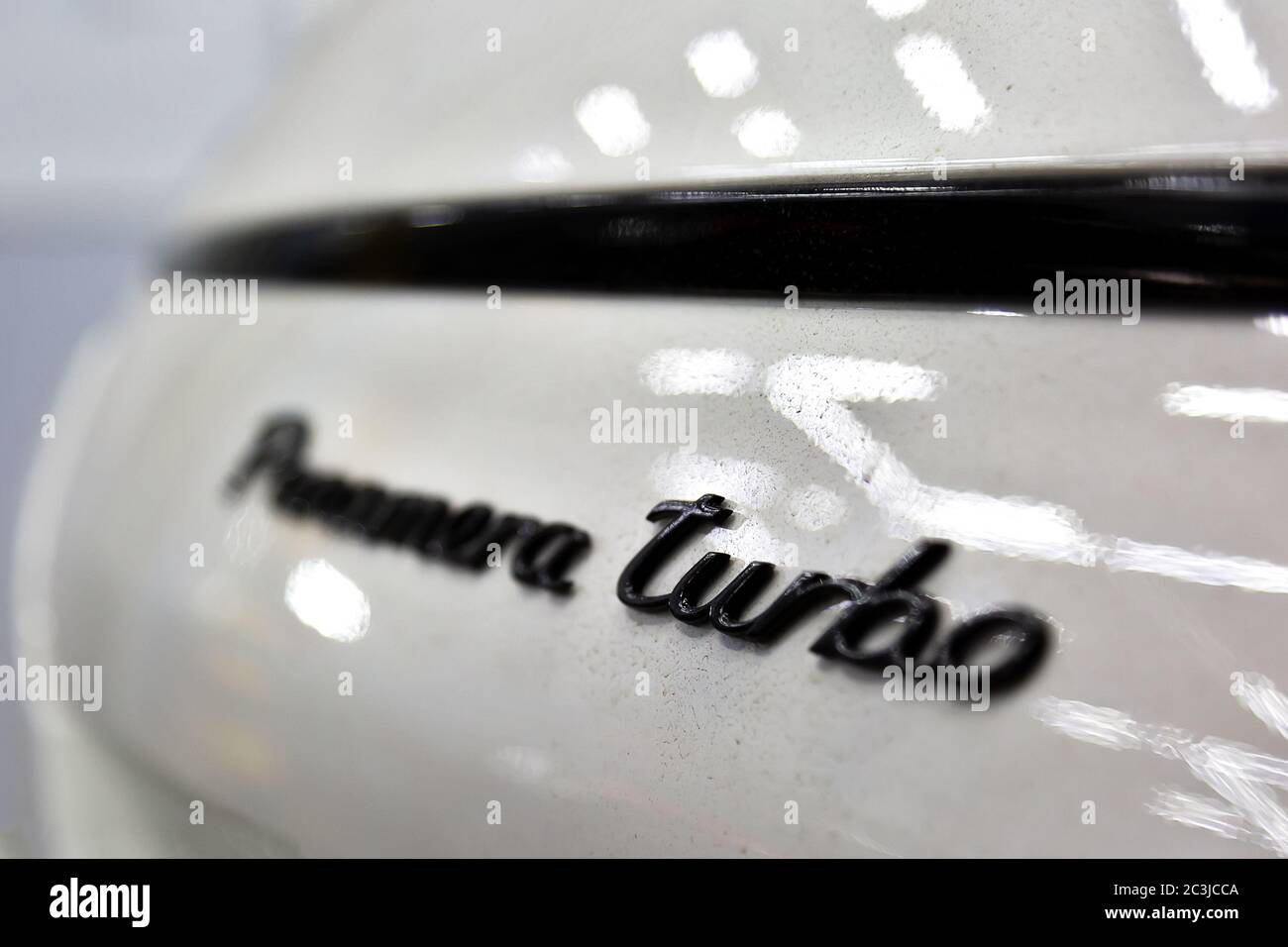 Moscow. November 2018. Porsche Panamera emblem logo in black on white ...