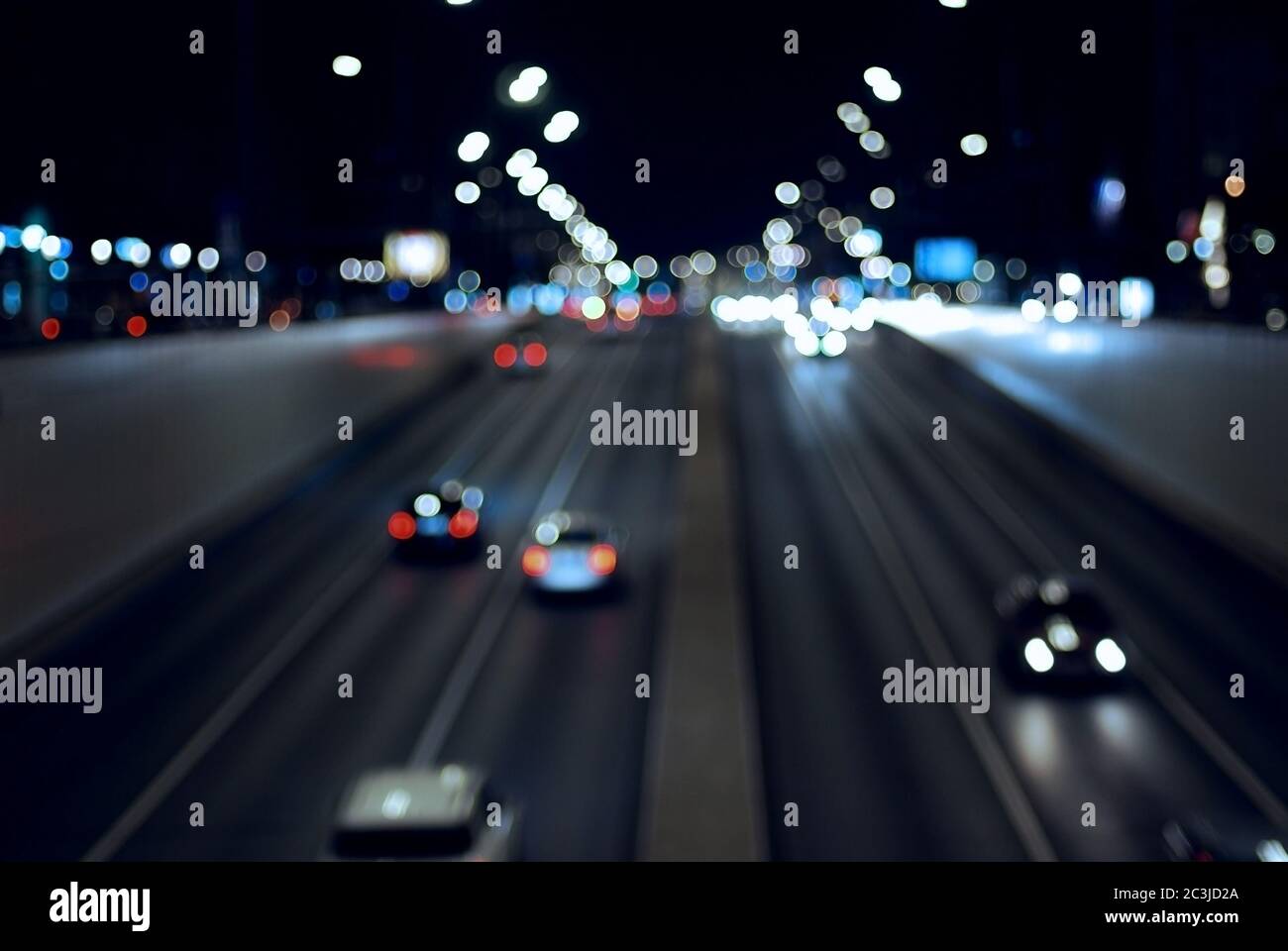 Blurry night city traffic background Stock Photo - Alamy