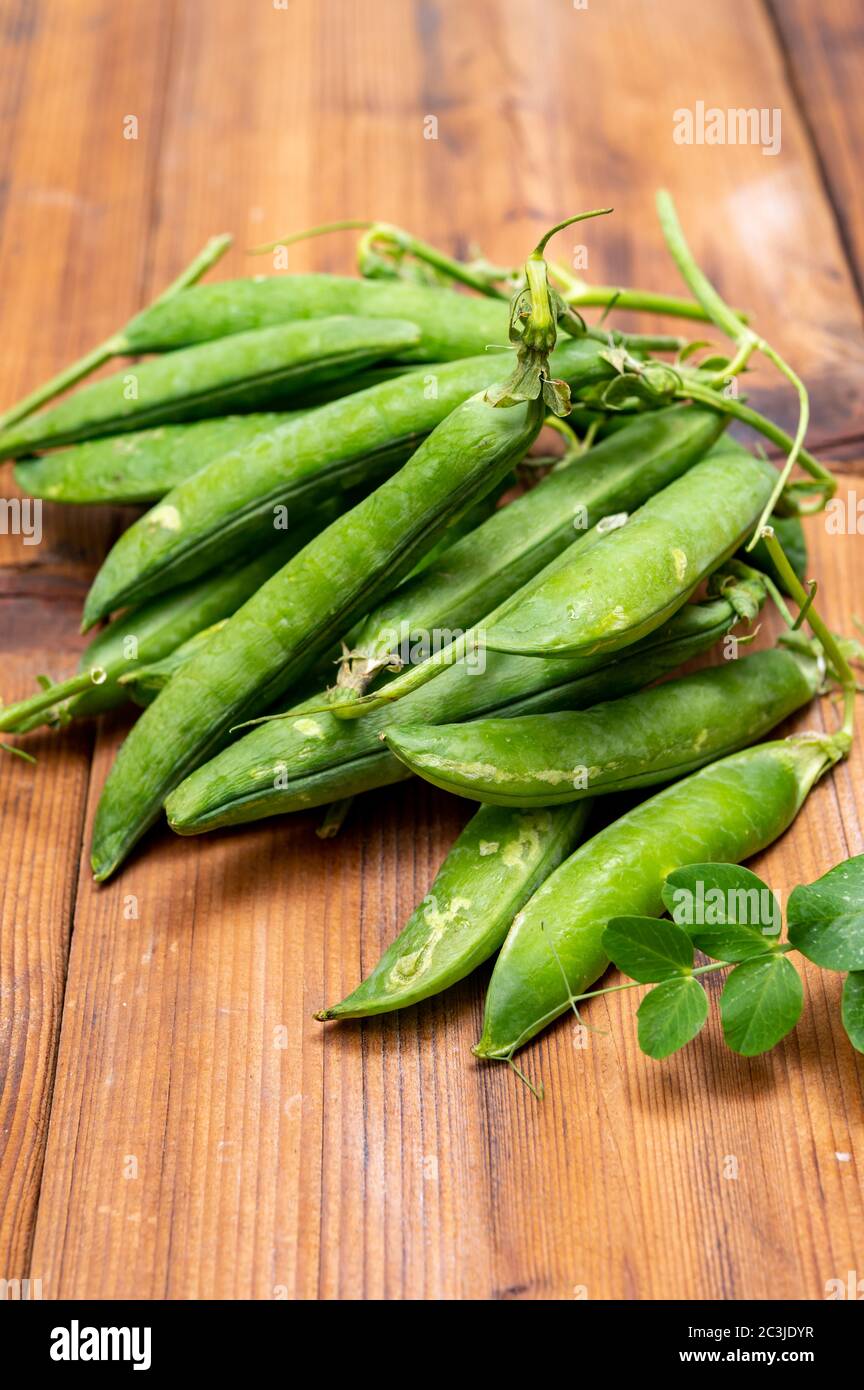 New harvest of fresh ripe green peas legumes Stock Photo - Alamy