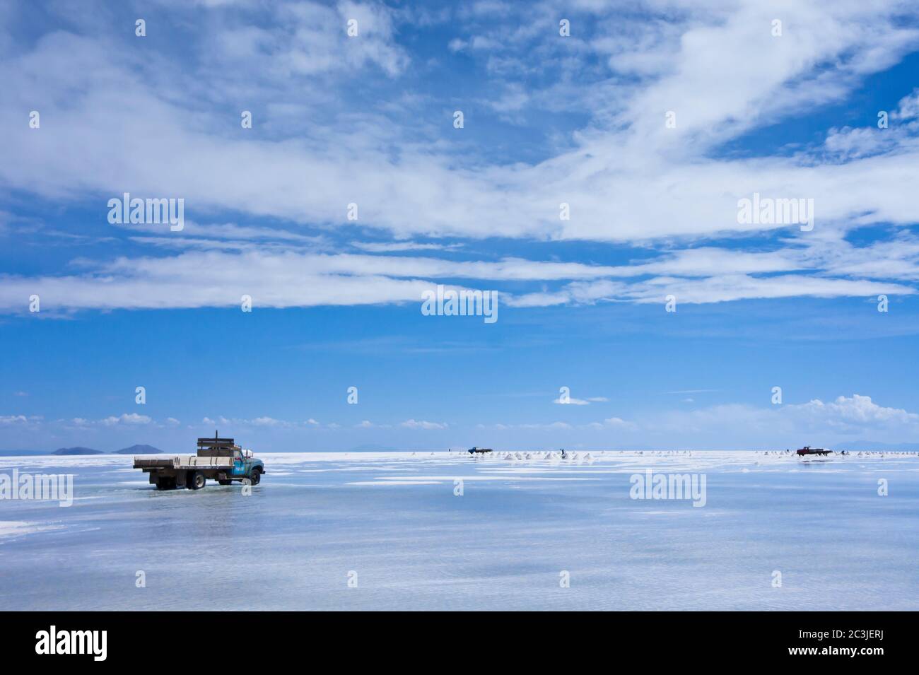 Fantastic horizon over the lake Salar de Uyuni, Salt production ...