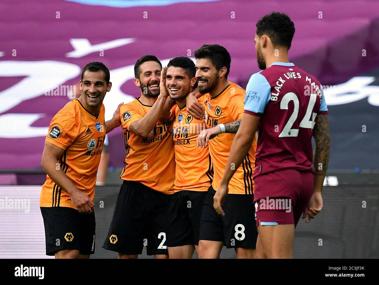 Wolverhampton Wanderers' Pedro Neto (centre) celebrates scoring his ...