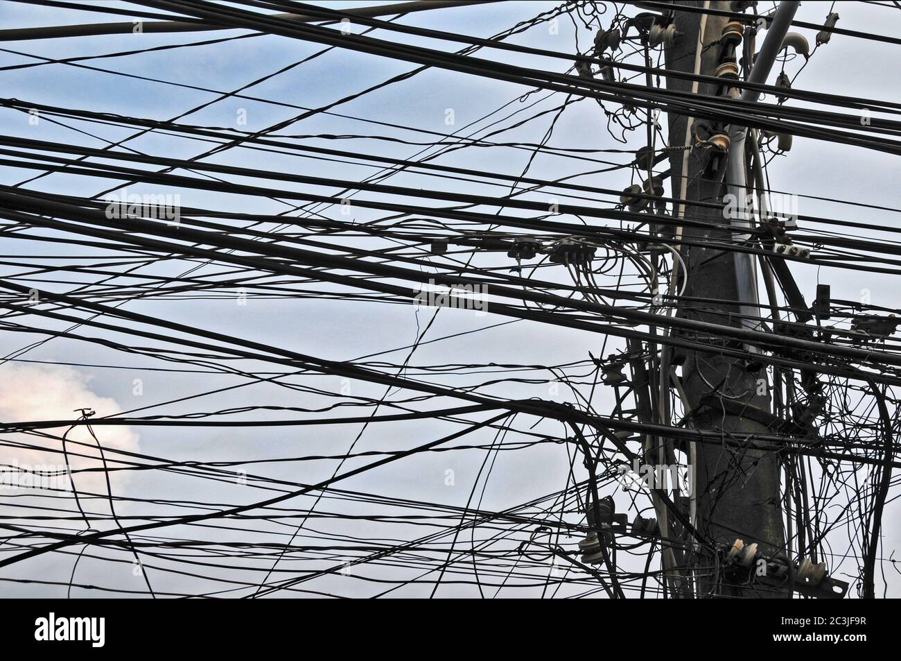A Lot of Electric Cables over a Cloudy Sky in Vietnam Stock Photo - Alamy