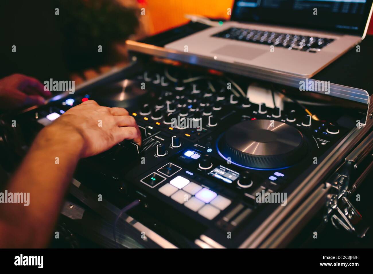 Overhead shot of Dj controling red party dj audio equipment.Turntable ...