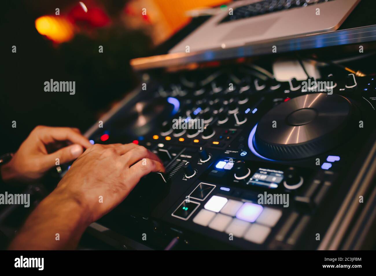 Overhead shot of Dj controling red party dj audio equipment.Turntable ...
