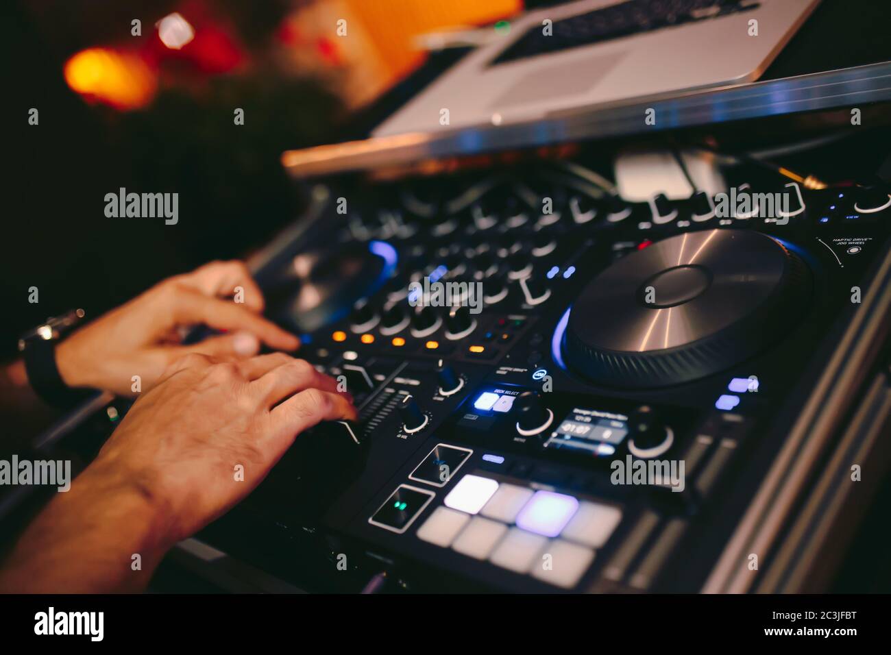 Overhead shot of Dj controling red party dj audio equipment.Turntable ...