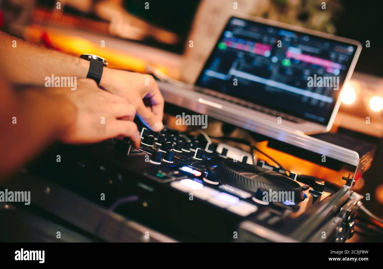 Overhead shot of Dj controling red party dj audio equipment.Turntable ...