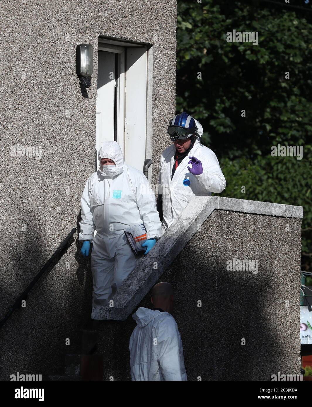 Forensic investigators at the scene of a fire at a flat in Paisley ...