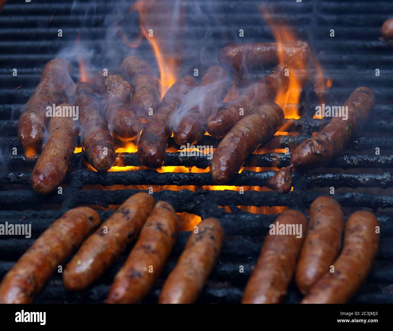 Bbq sausages grilling on grill hi-res stock photography and images - Alamy