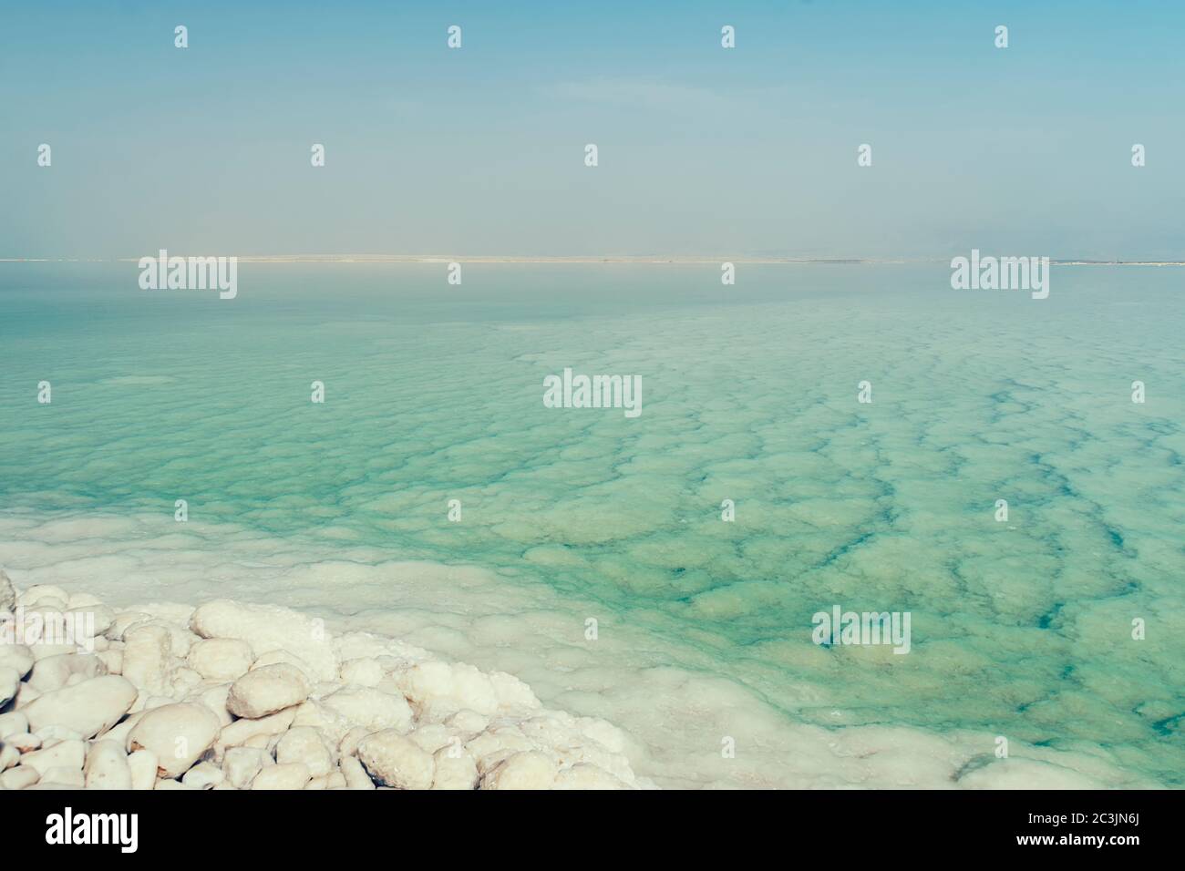 Salt accumulation on Dead Sea shore in Jordan Stock Photo - Alamy