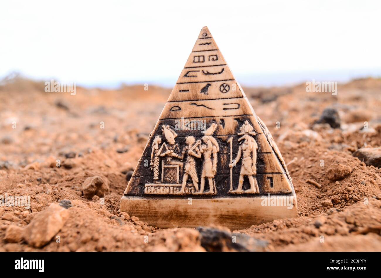 Egyptian Pyramid Model Miniature in the Rock Desert Stock Photo - Alamy