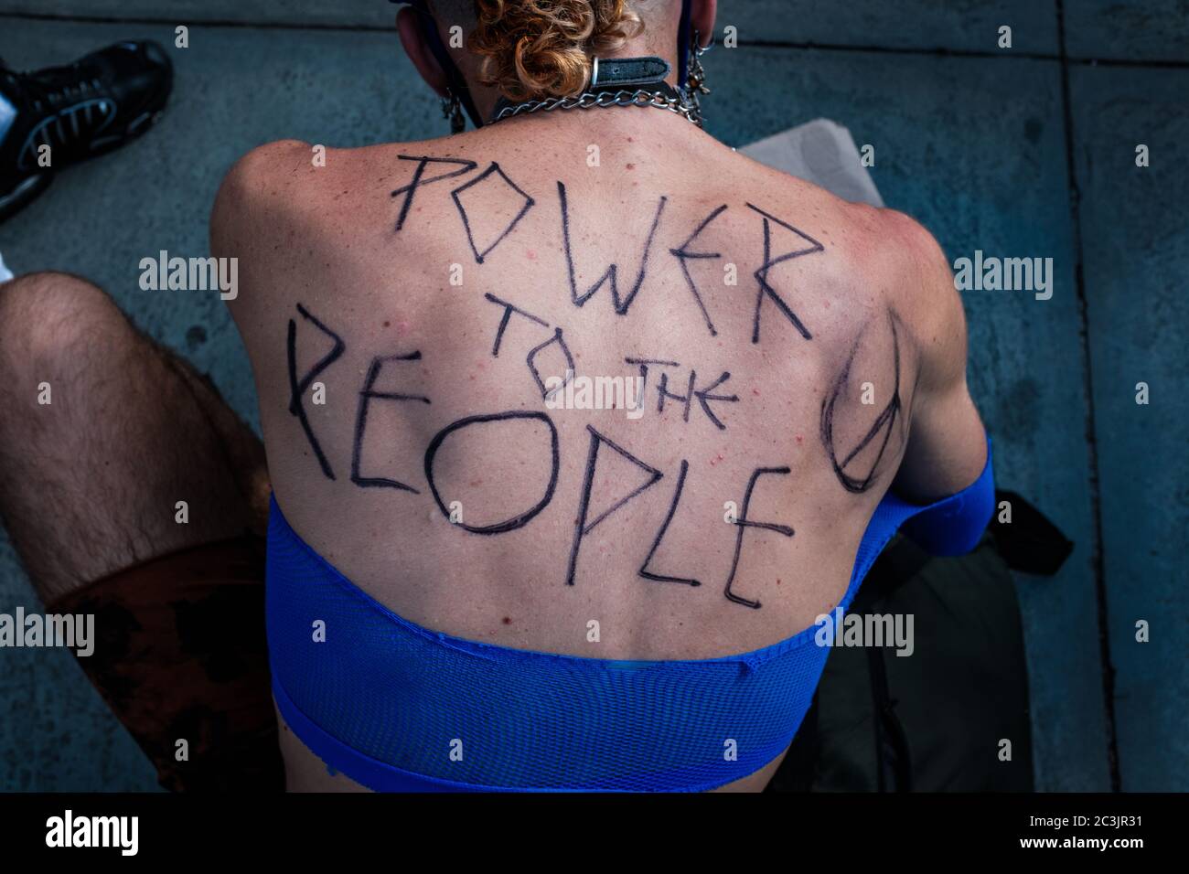 Blm protestor writing on back hi-res stock photography and images - Alamy