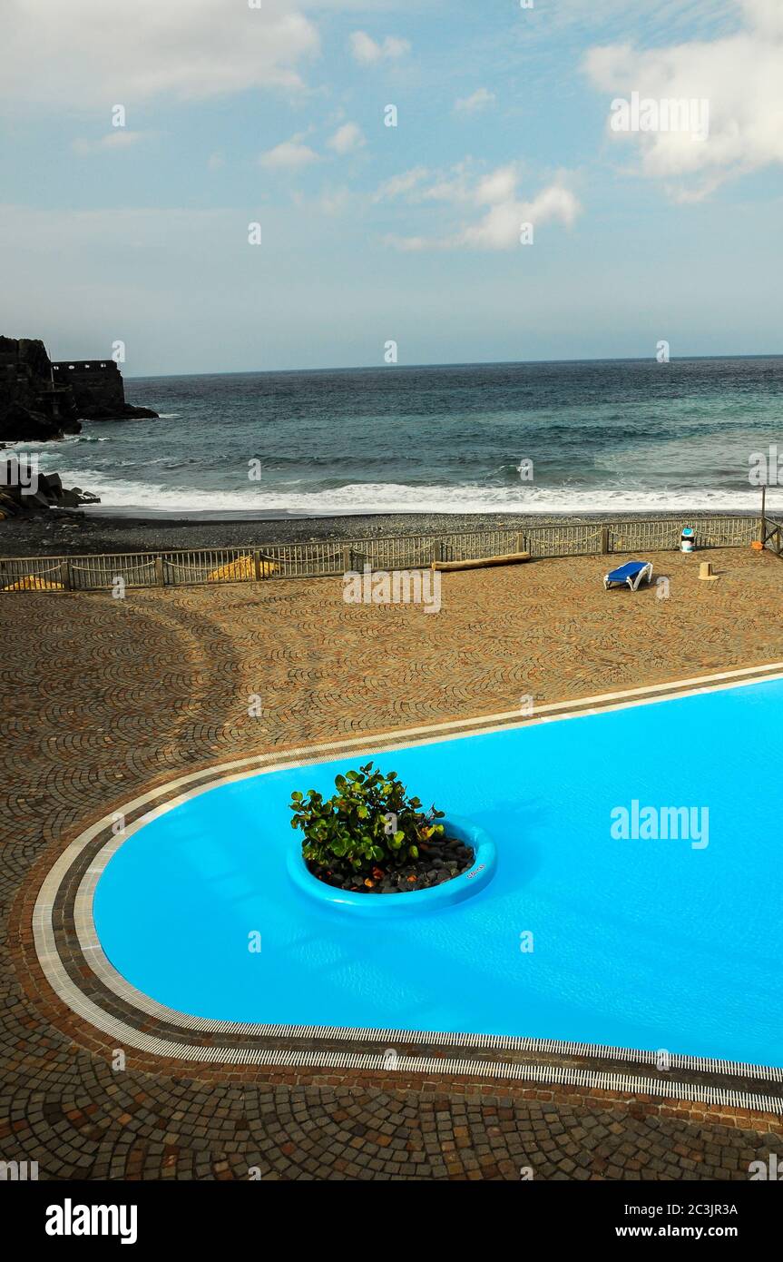 Blue Swimming Pool near the Atlantic Ocean Stock Photo - Alamy