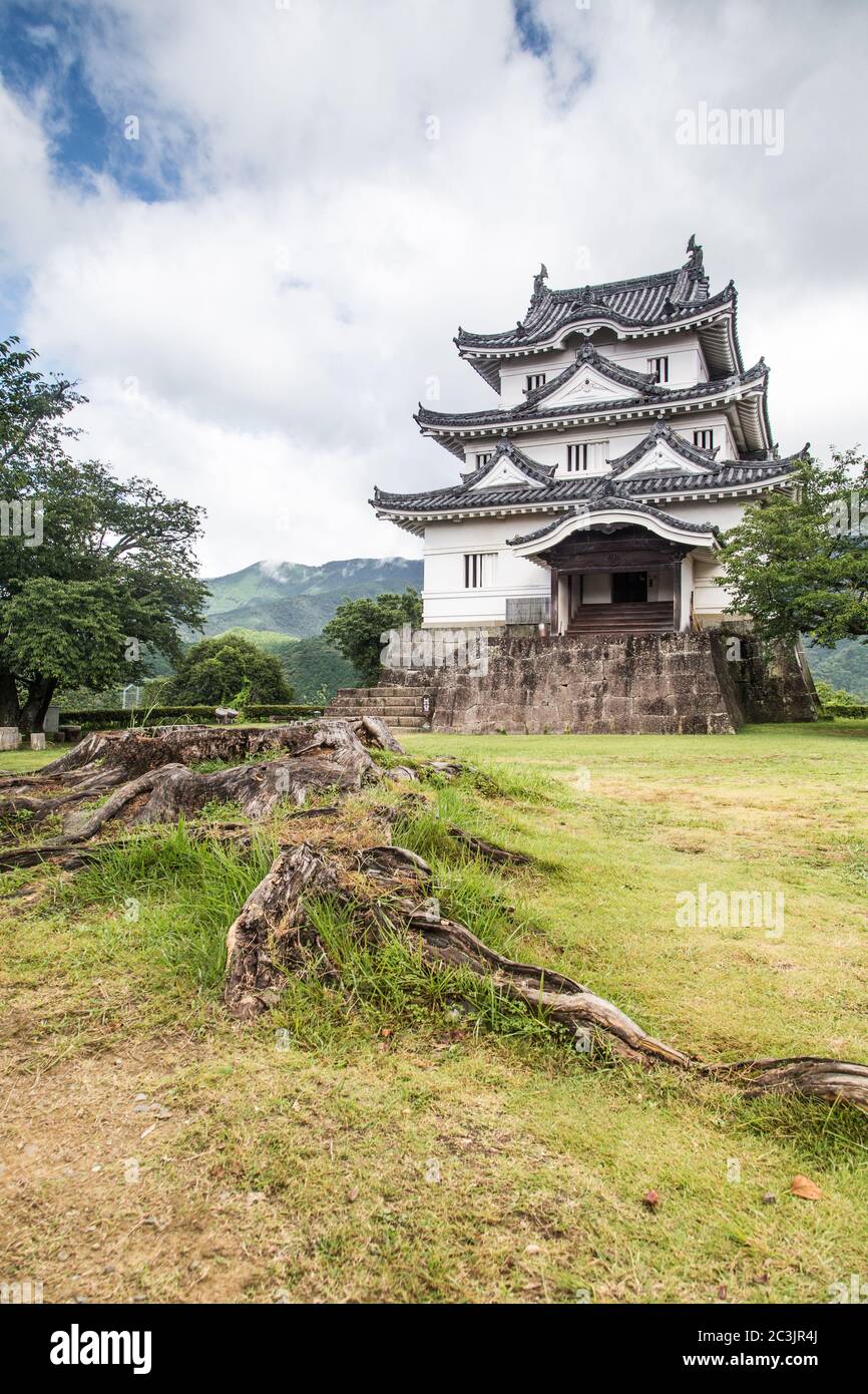 Low angle shot of the magnificent Uwajima Castle captured under the ...
