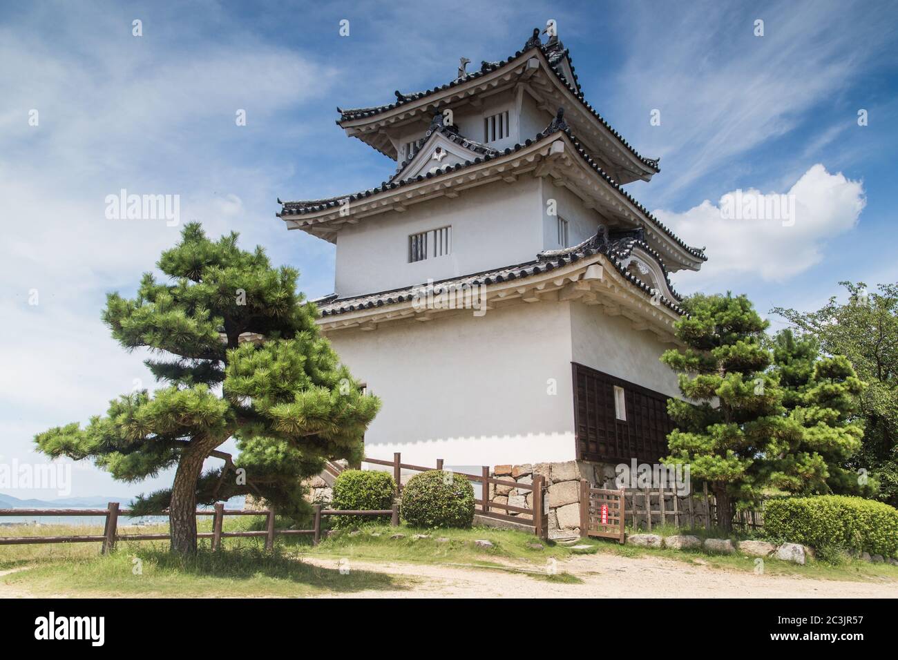 Low angle shot of the magnificent Uwajima Castle captured under the ...