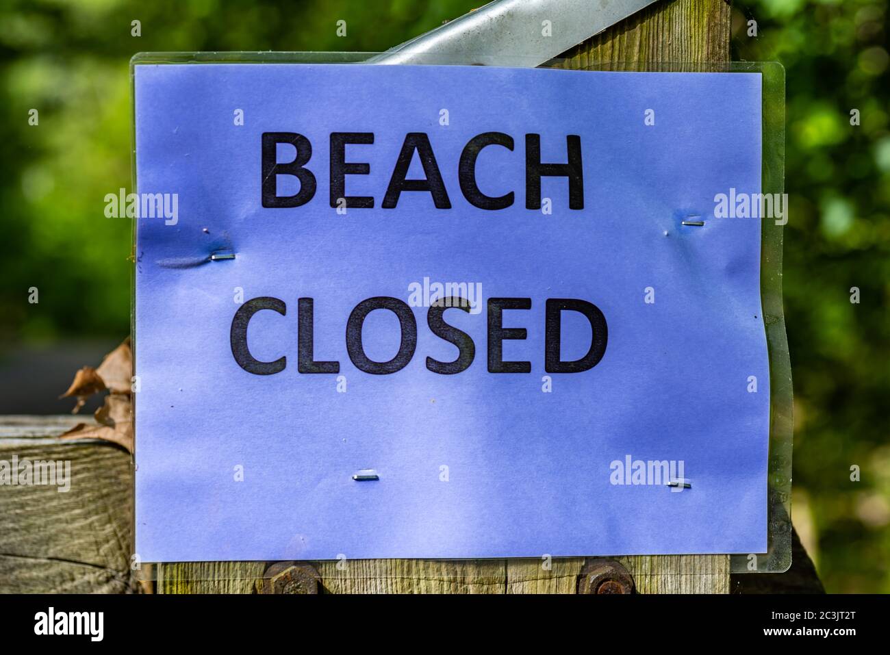 Signs for beach closure due to the Covid-19 pandemic Stock Photo - Alamy