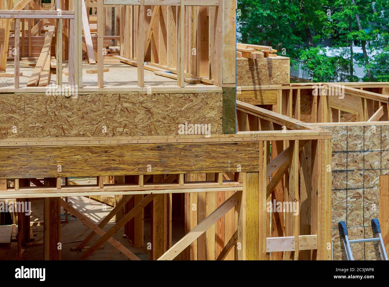 Framing beam on new house under construction home beam construction ...