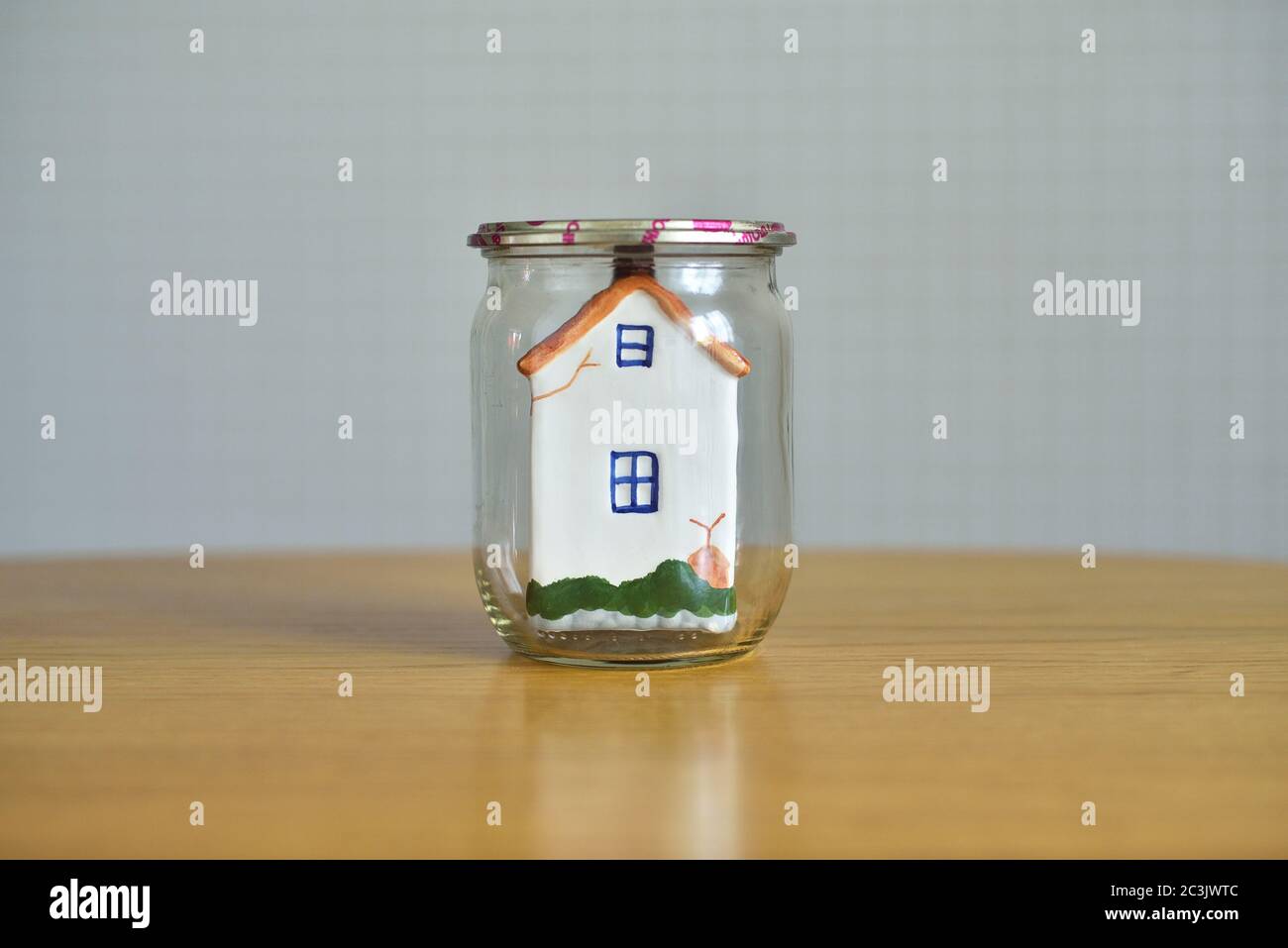 House inside jar hi-res stock photography and images - Alamy