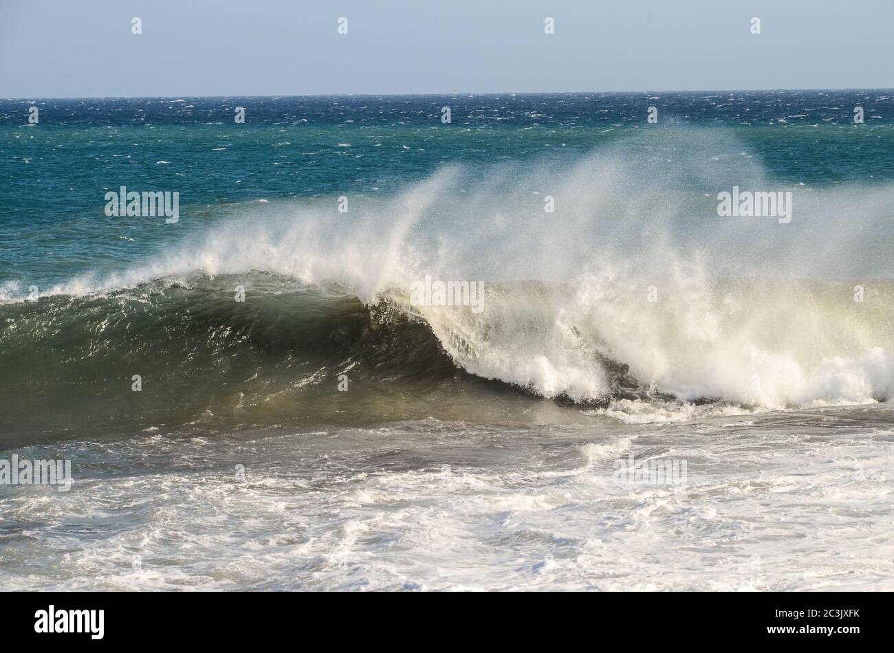 Big Blue Wave Breaks in the Atlantic Ocean Stock Photo - Alamy