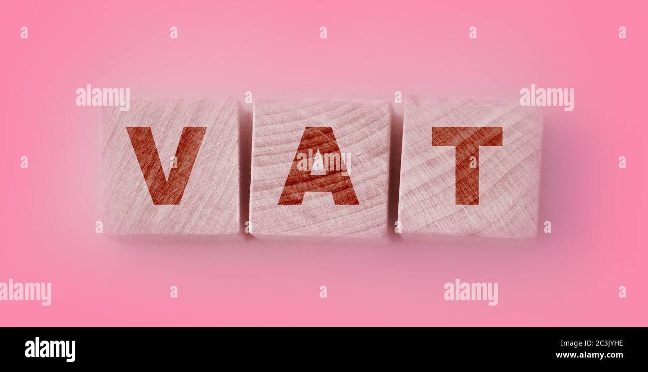 Vat on wooden cubes over blur background with copy spcae, financial ...