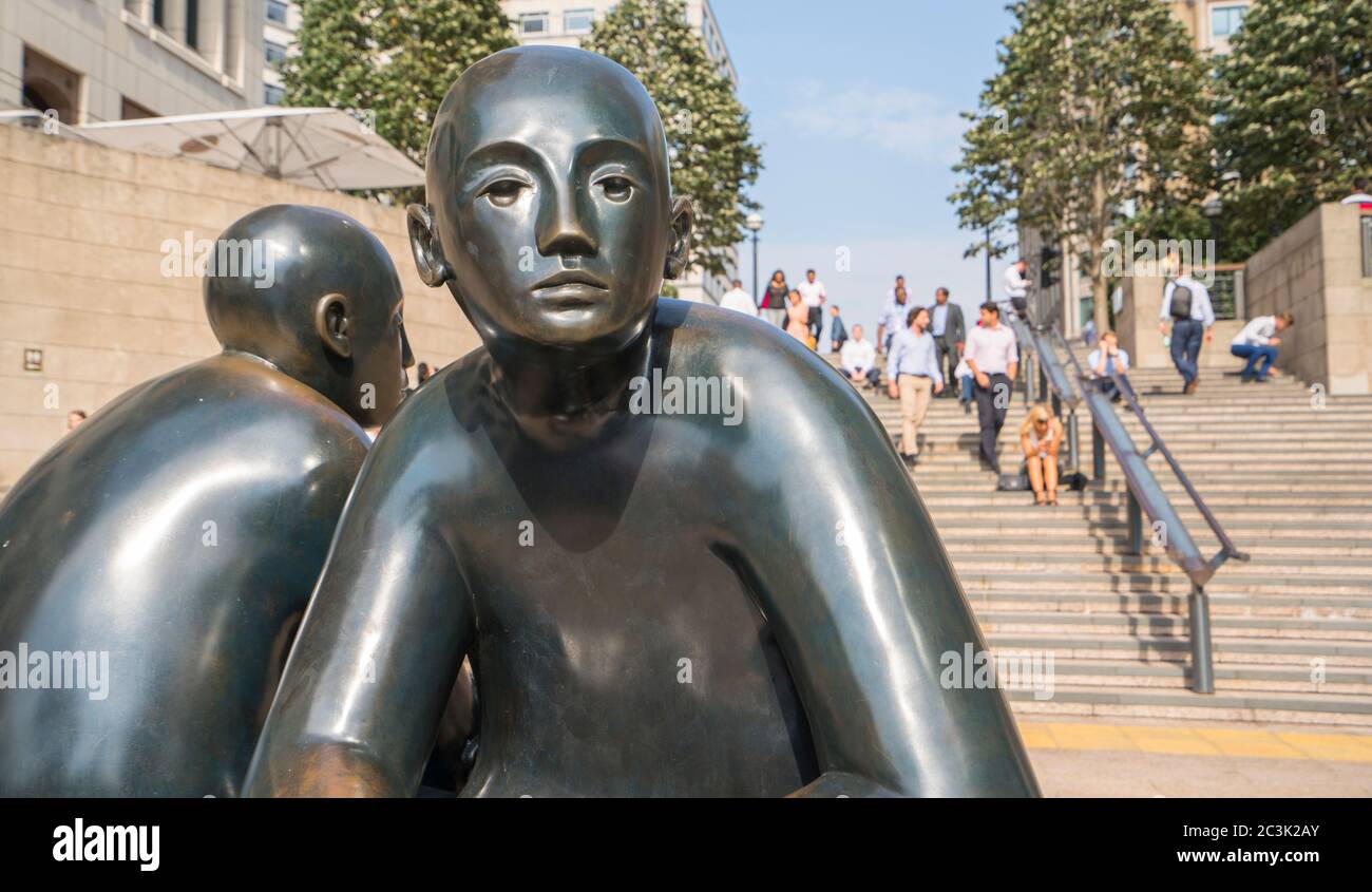 Statue of two sitting men at Cubitt steps in Canary Wharf - LONDON ...