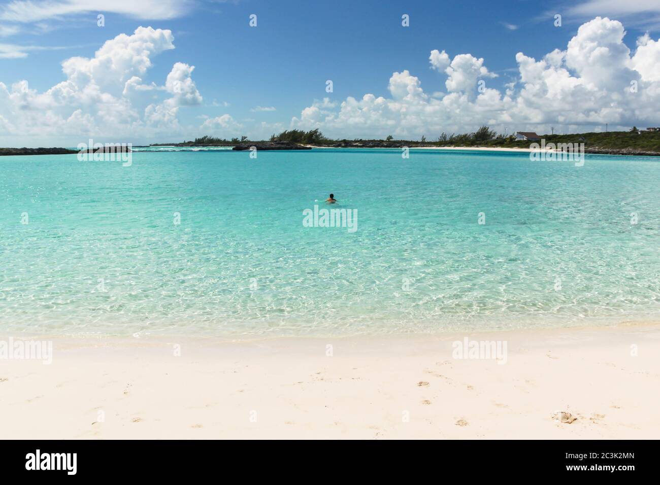 Beautiful blue ocean and white sand beach on clean blue sky background ...