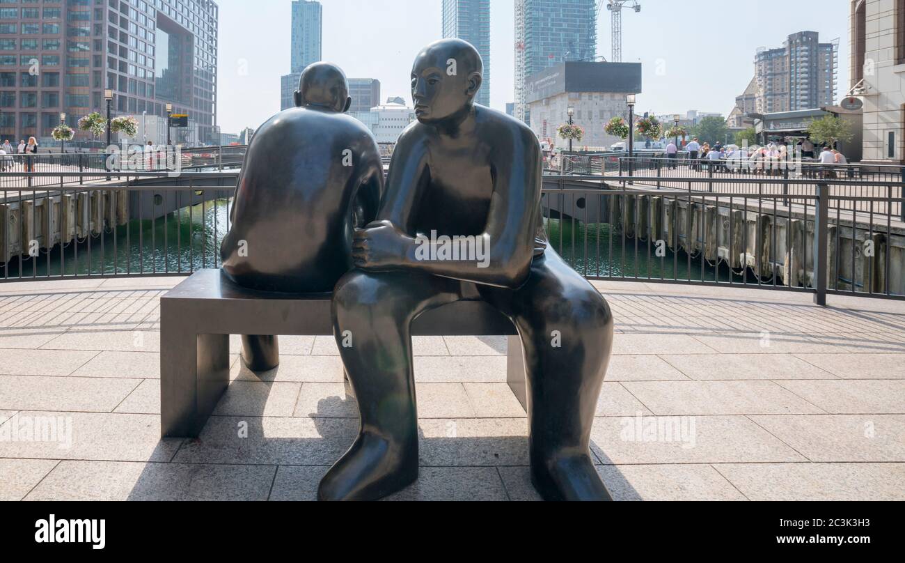 Statue of two sitting men at Cubitt steps in Canary Wharf - LONDON ...