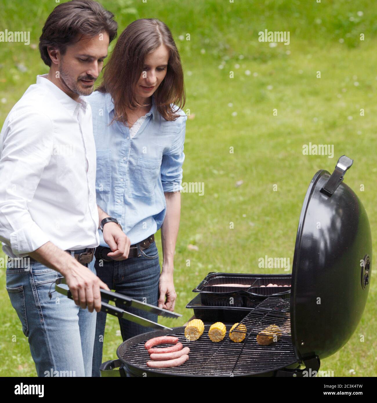 Romantic couple enjoying outdoor meal hi-res stock photography and ...