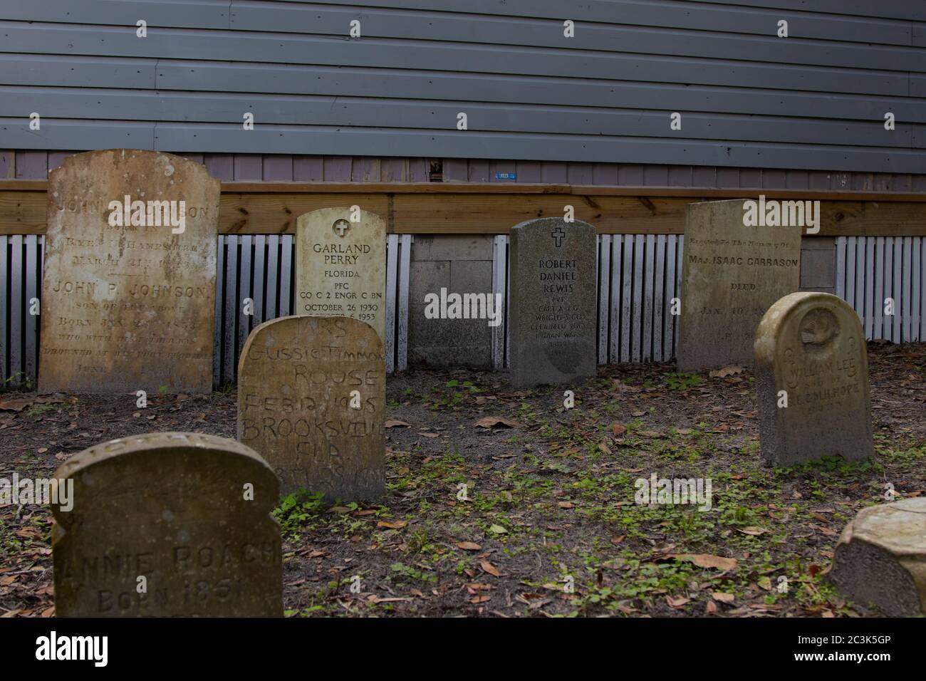 Tombstones at the historic May-Stringer Victorian house from the mid ...