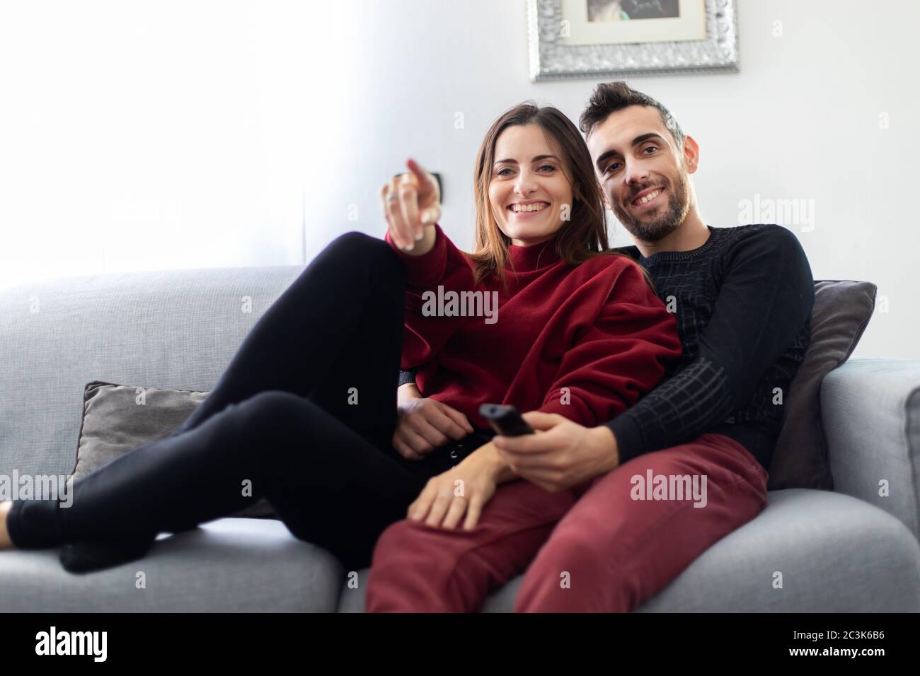Couple watching a movie in their house Stock Photo - Alamy