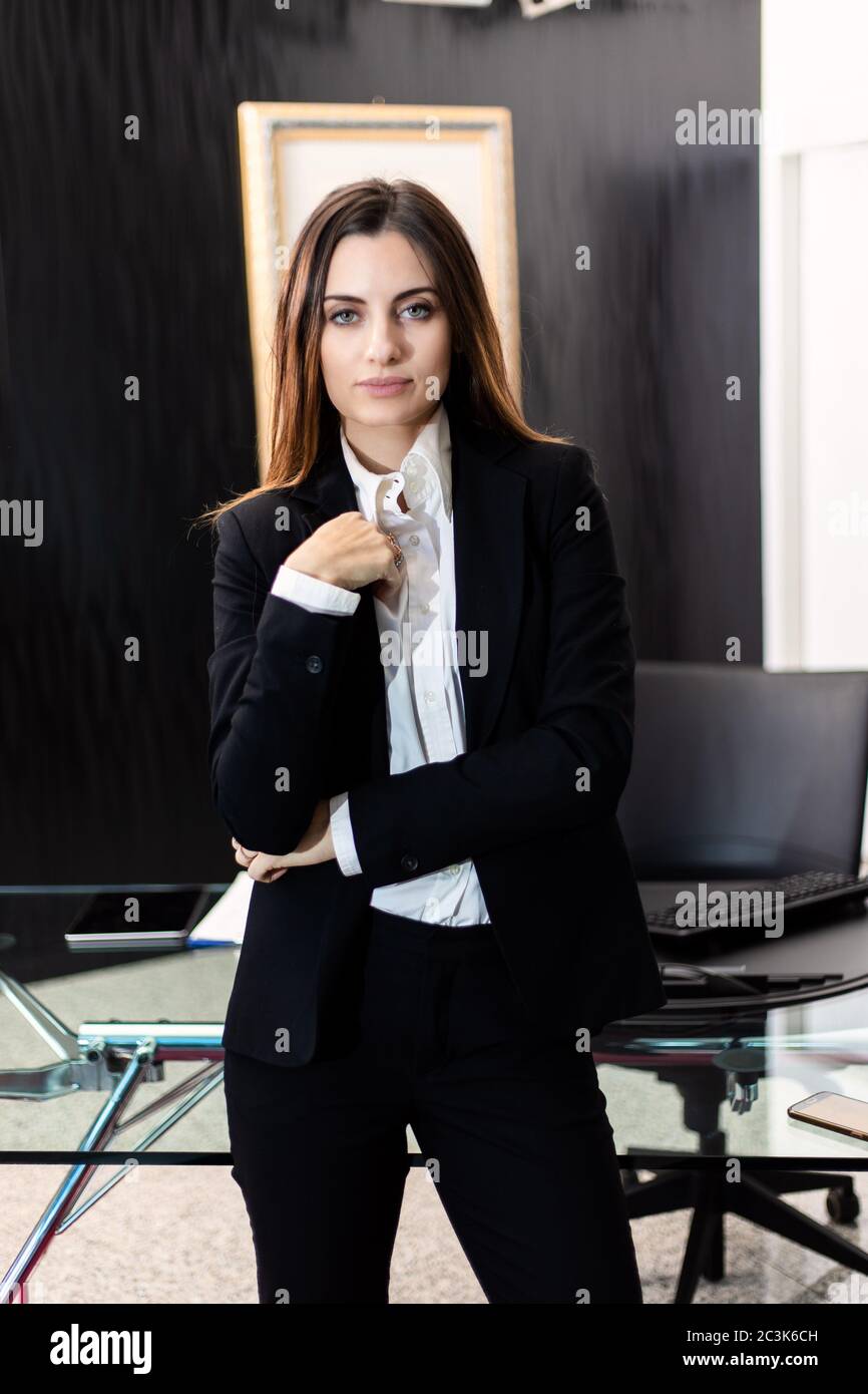Young female manager in her modern office Stock Photo - Alamy
