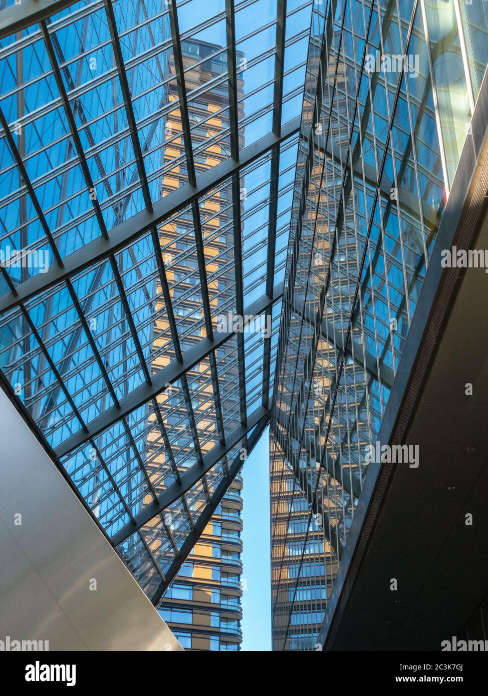 View through glass canopy in Broadgate Plaza to the tower of Principle ...