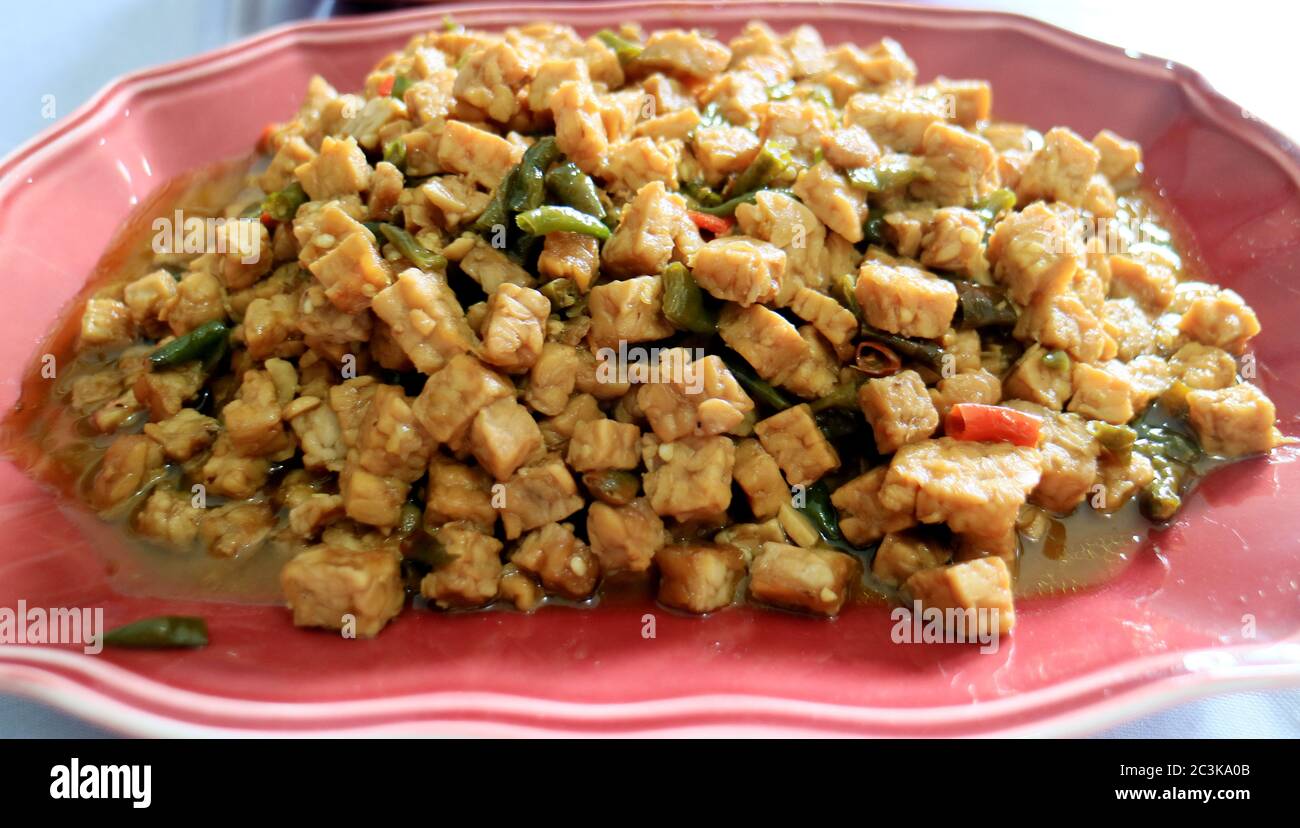 Oseng tempe. Traditional Indonesian food Stock Photo - Alamy