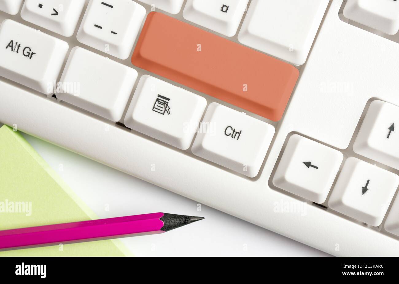 Different Colored Keyboard key With Accessories Arranged On Empty copy ...