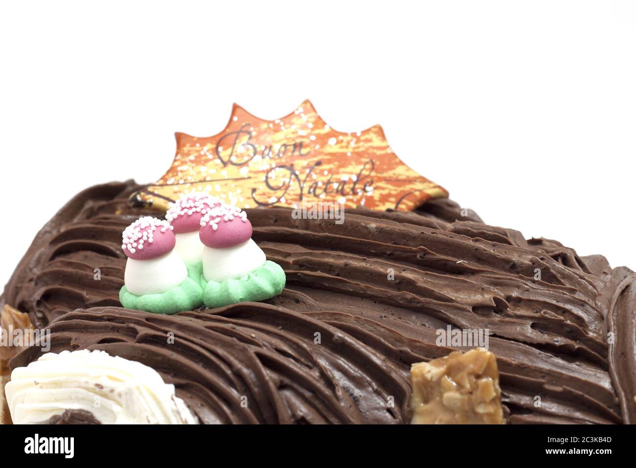 Delicious traditional sweet Christmas log isolated on a white ...