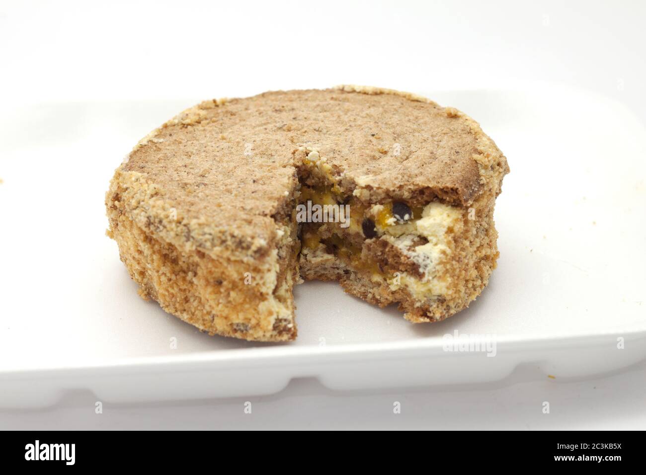 Delicious small round cake isolated on a white background Stock Photo ...